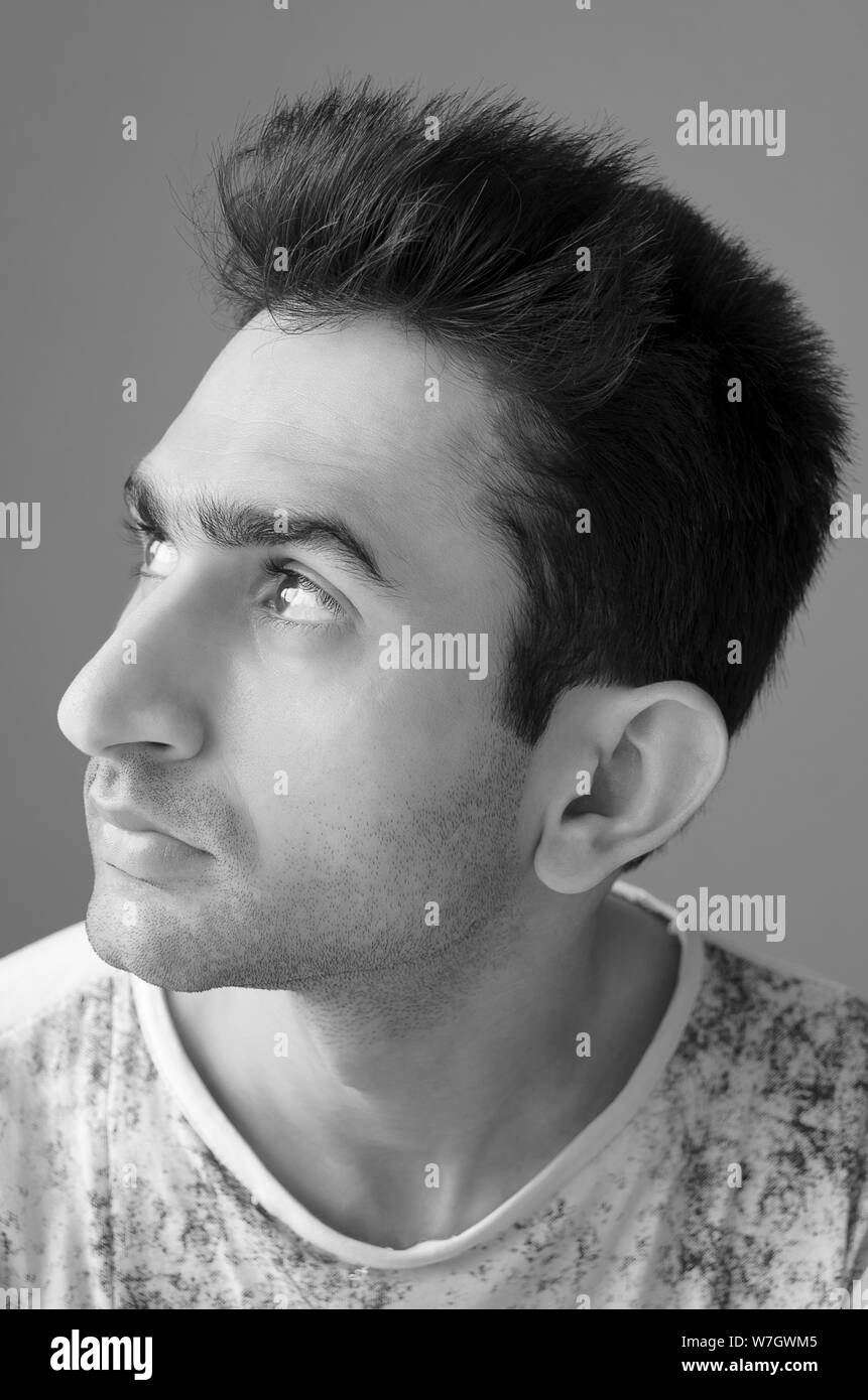 Black and white portrait of a man looking towards right Stock Photo - Alamy