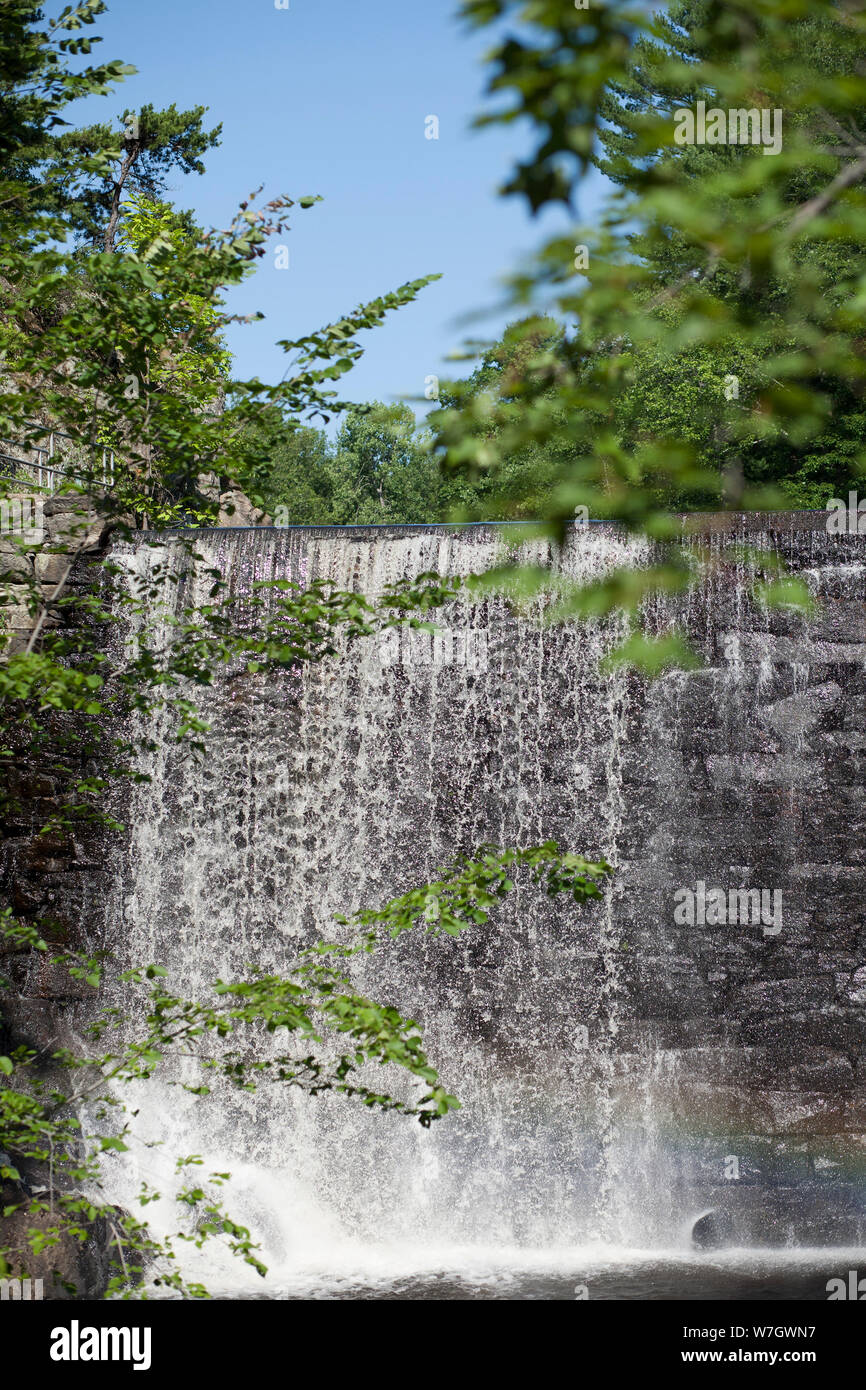 Water spills over dam at Puffer Pond in Amherst, Massachusetts Stock ...