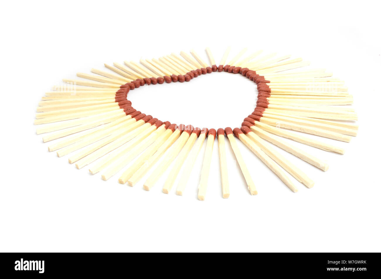 Match sticks arranged to form a heart shape with shallow depth of field ...