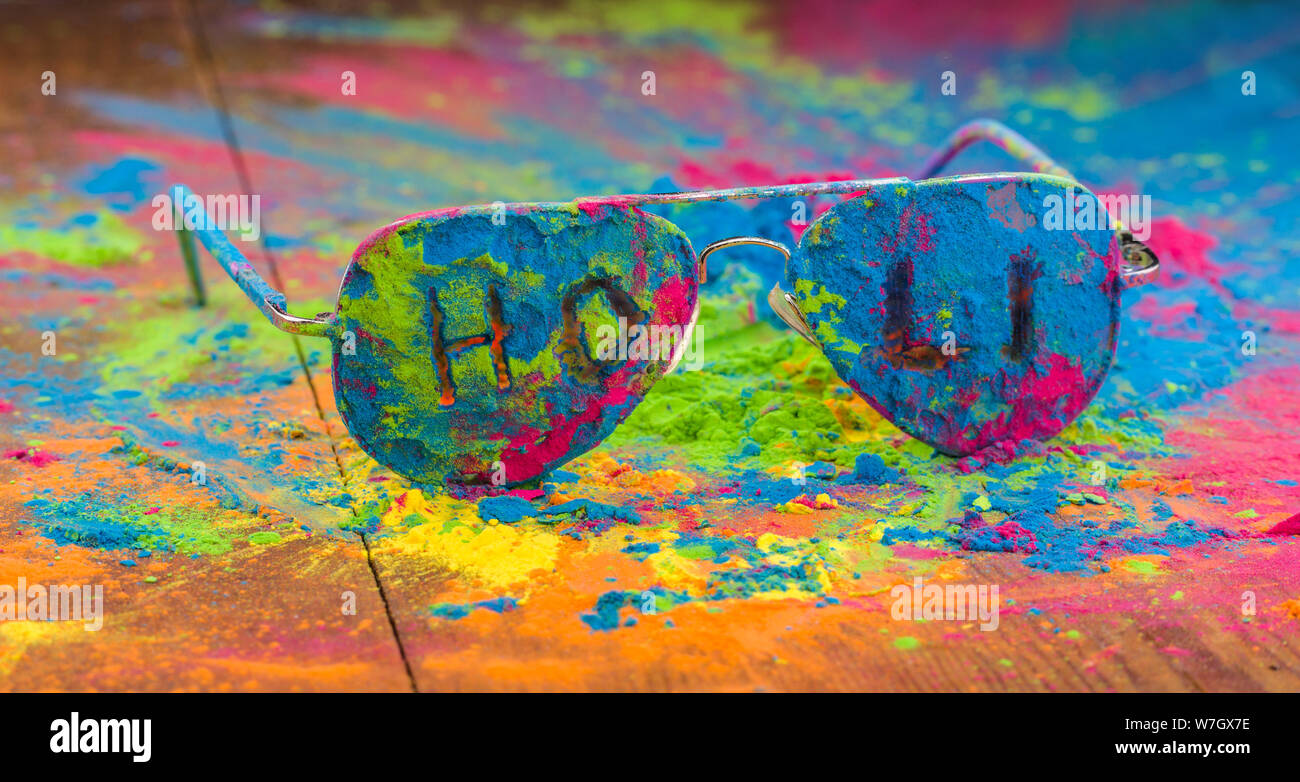 Holi color powder on sunglasses. Organic Gulal colours on eyeglasses ...