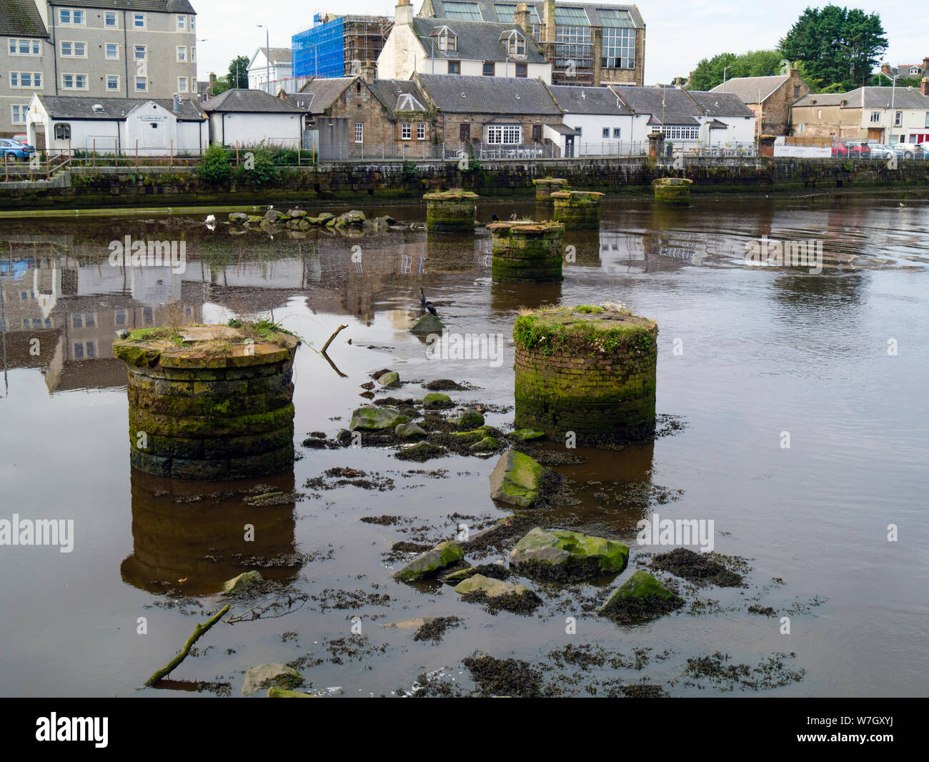 stone pillars in the river Ayr are all that remain of the bridge that ...