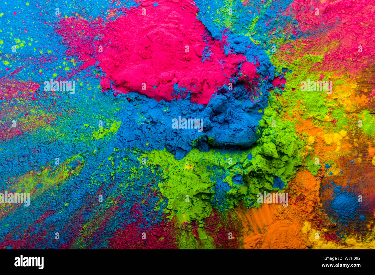 Abstract colorful Happy Holi background. Color vibrant powder on wood ...