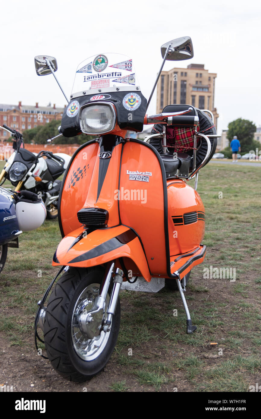 Orange scooter hi-res stock photography and images - Alamy