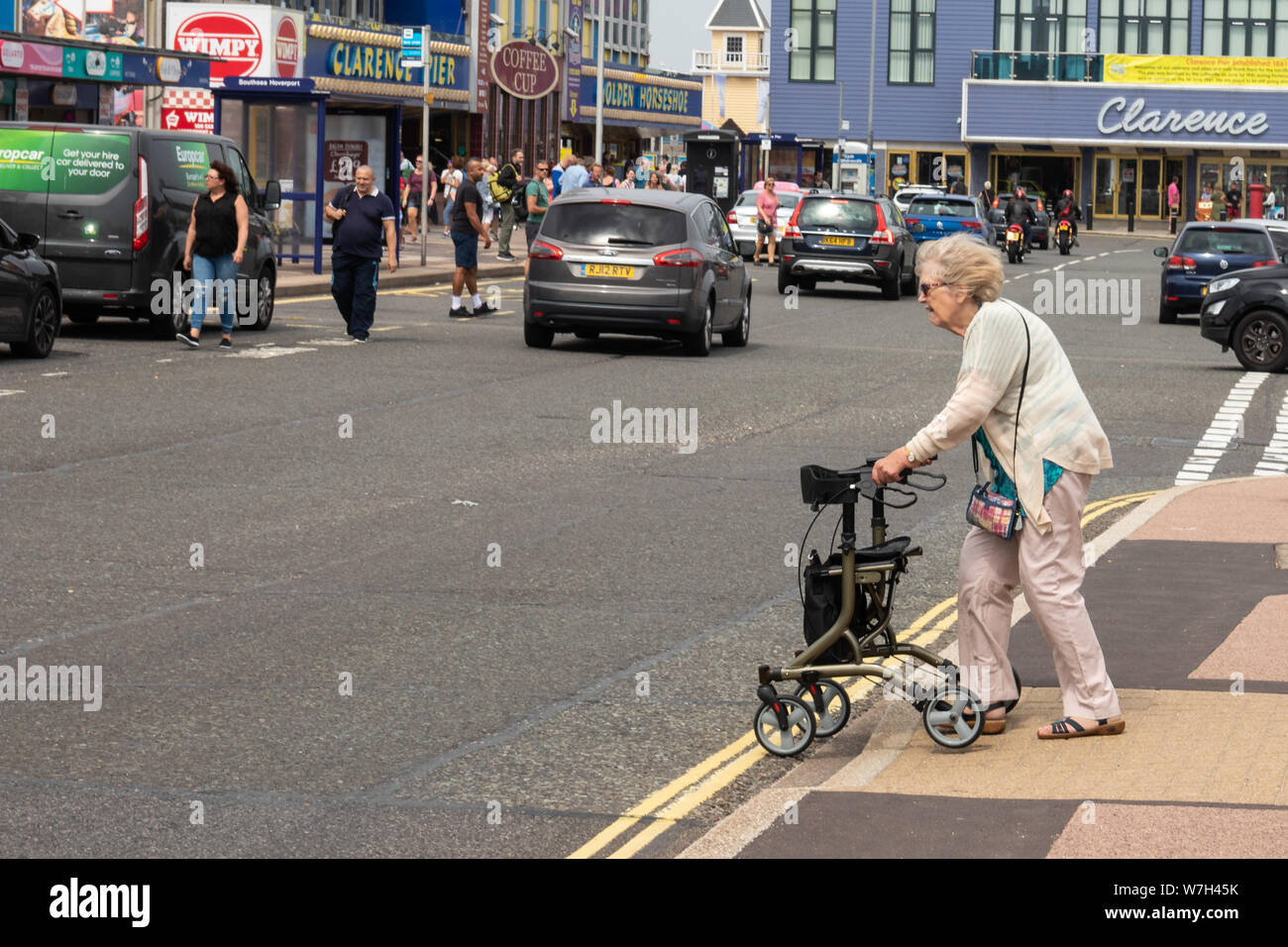 Old lady crossing road hi-res stock photography and images - Alamy