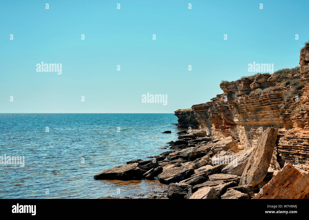 beautiful sandy rocks by the sea Stock Photo - Alamy