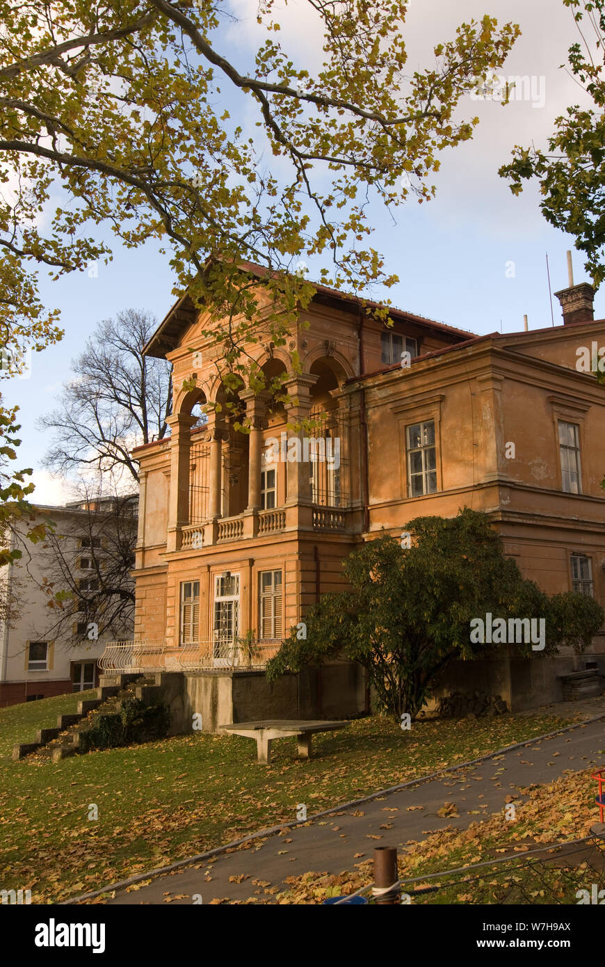 Front view of antique mansion with vintage design Stock Photo - Alamy