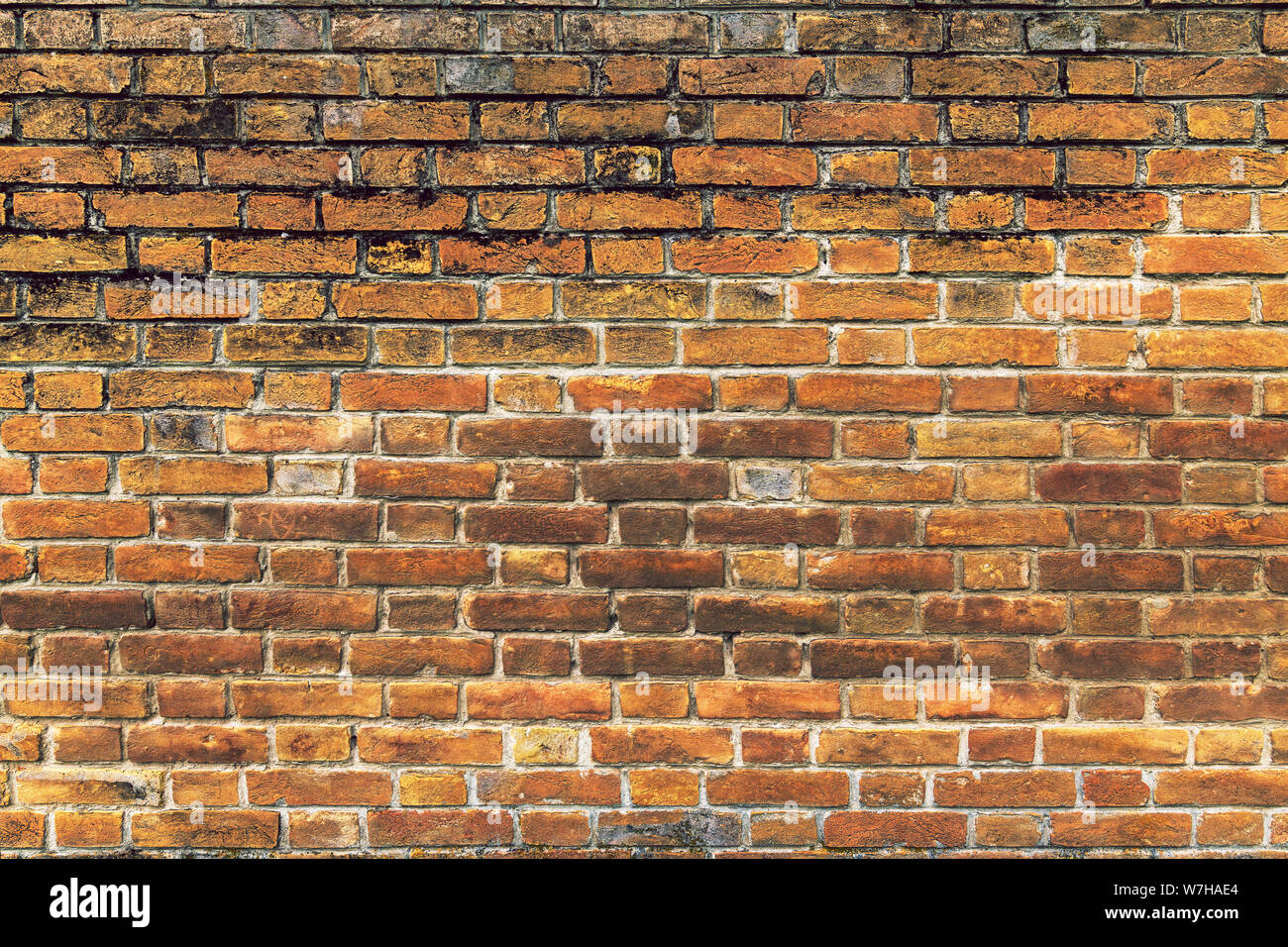 Old brick wall background, distressed messy grunge exterior facade ...