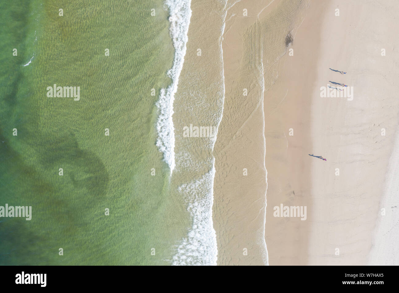 The waters of the Atlantic Ocean bathe a scenic beach on Cape Cod ...