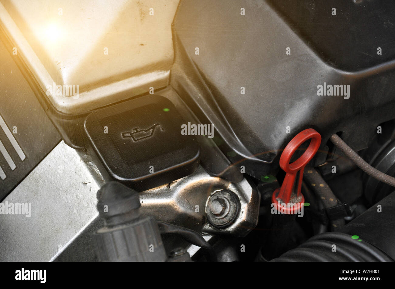 Service and Repair. Motor oil cap under the hood of a car Stock Photo ...