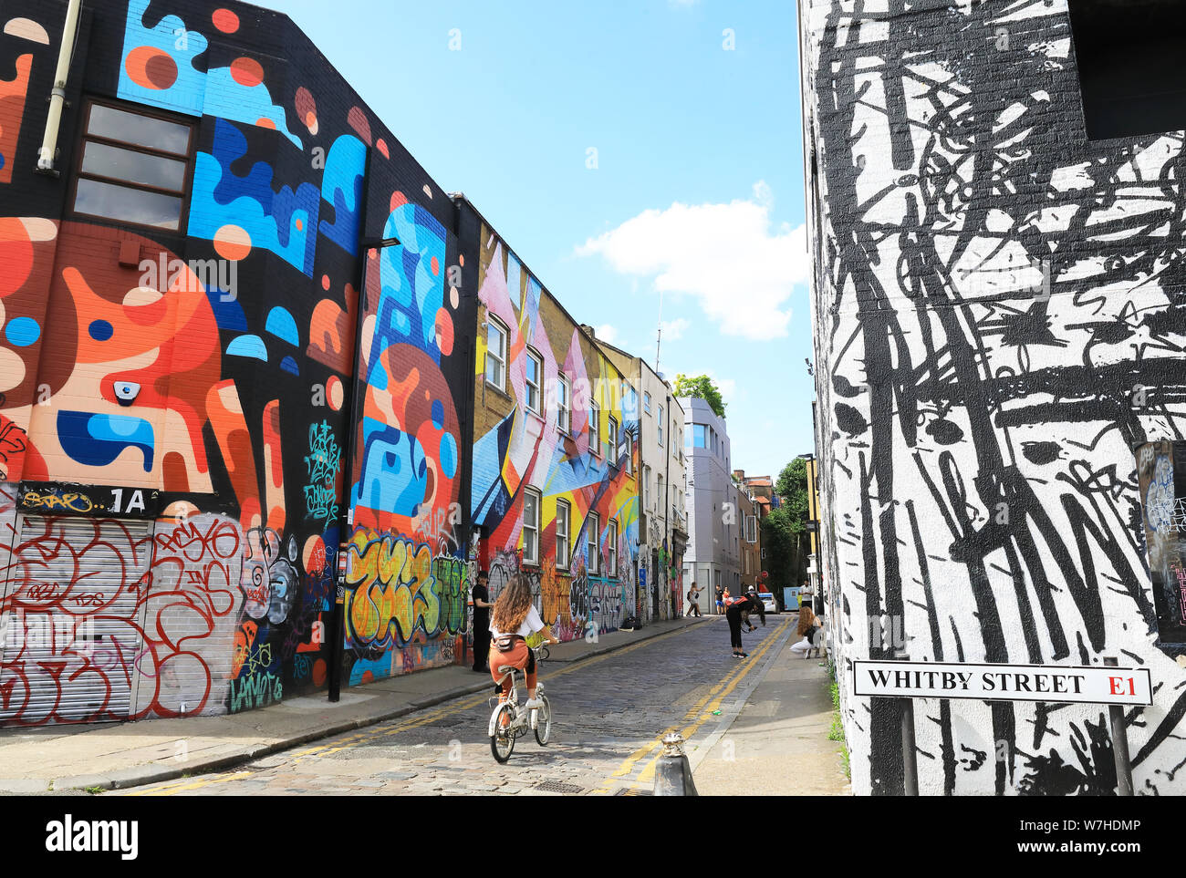 Street art on Whitby Street in trendy Shoreditch in east London E1 ...