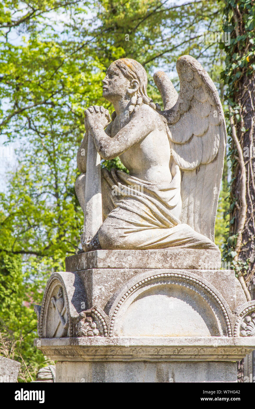 Lviv, Ukraine - April 26, 2019: Statues and tombstones at the Lychakiv ...