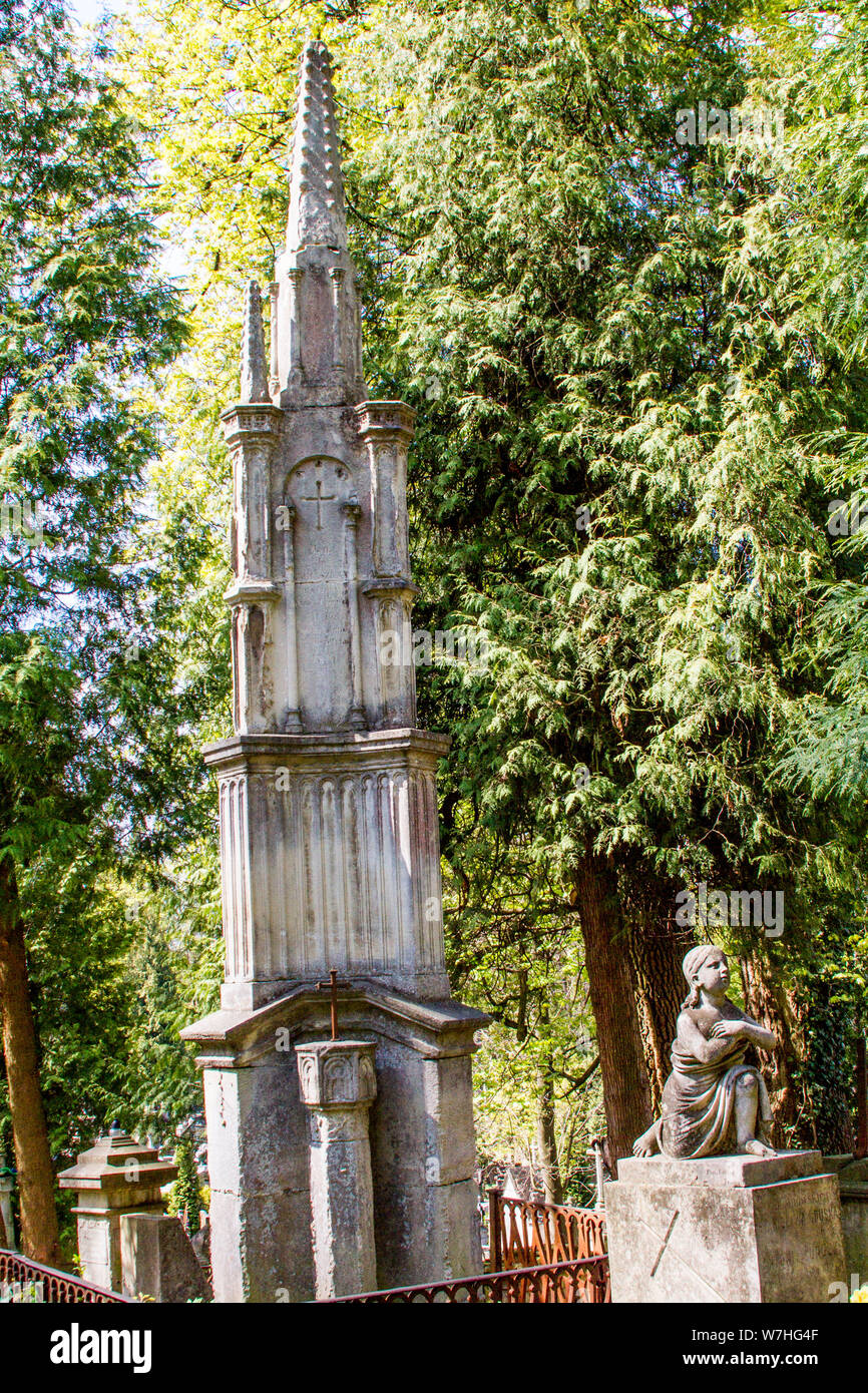 Lviv, Ukraine - April 26, 2019: Statues and tombstones at the Lychakiv ...