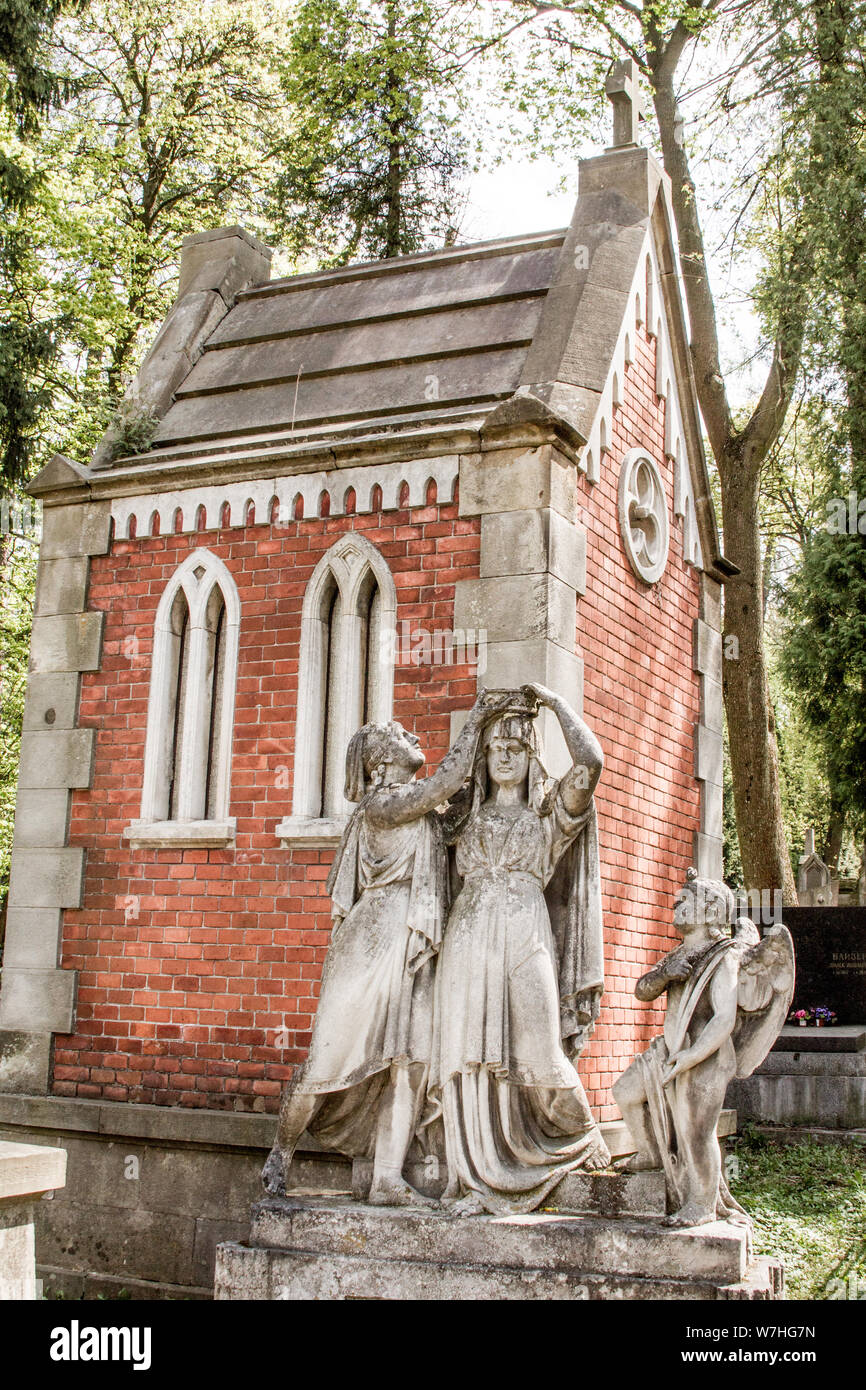 Lviv, Ukraine - April 26, 2019: Statues and tombstones at the Lychakiv ...