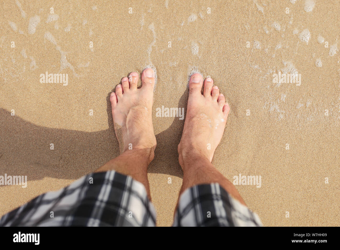 Wet female feet on the beach hi-res stock photography and images - Alamy