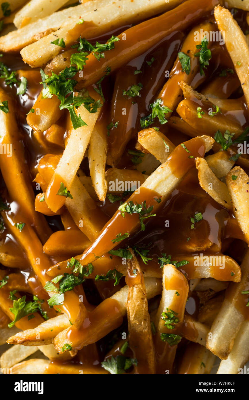 Homemade American Gravy Fries with Salt and Pepper Stock Photo - Alamy
