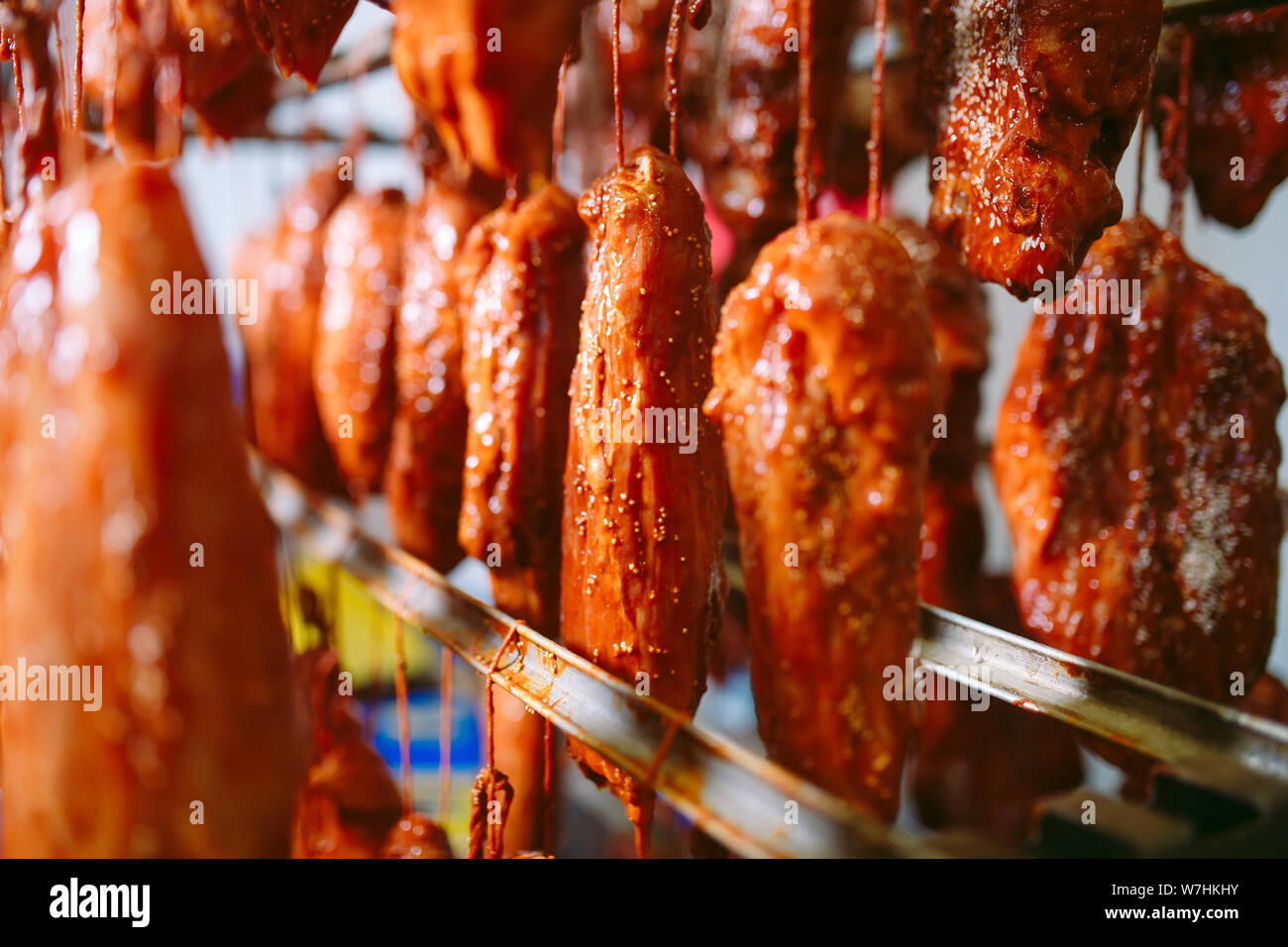 Smoked ham in the oven. Sausage production in the factory Stock Photo ...