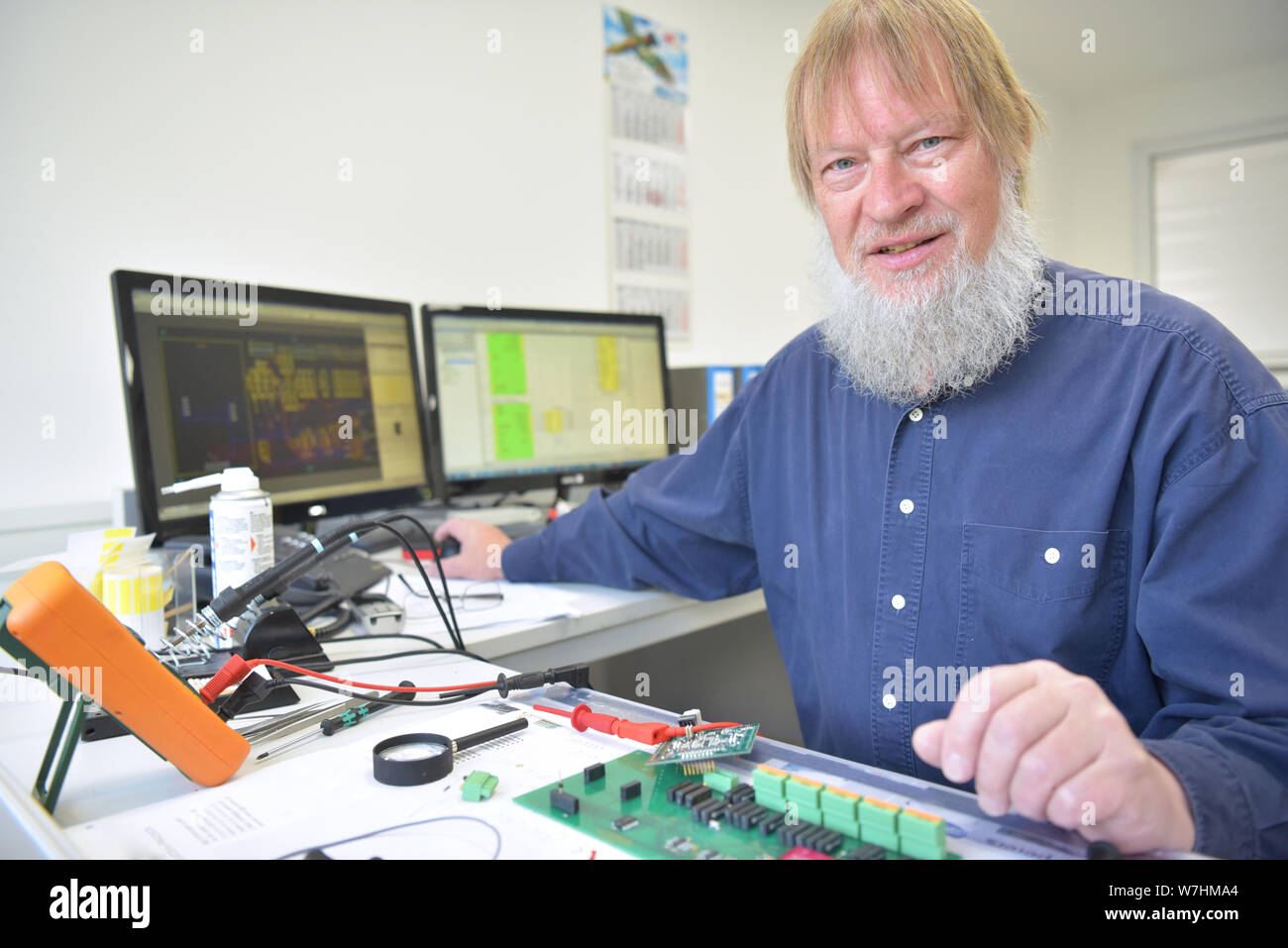 engineer at the workplace - assembly and development of electronics in ...