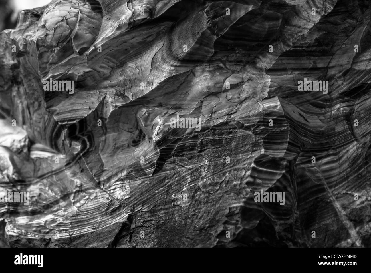 Natural black volcanic stone texture venetian plaster background. Dark ...
