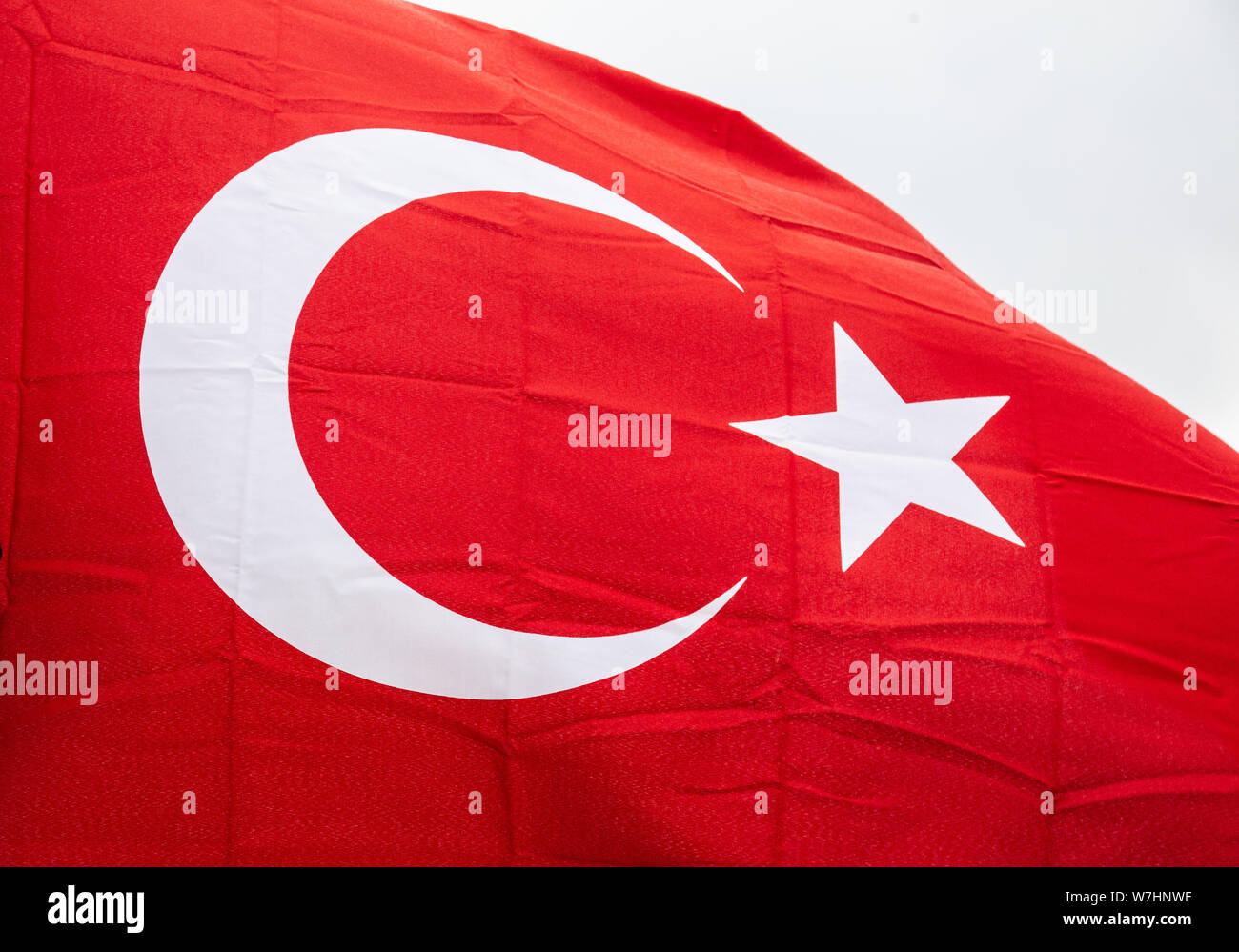 Flag of Turkey waving in the wind with highly detailed fabric texture ...