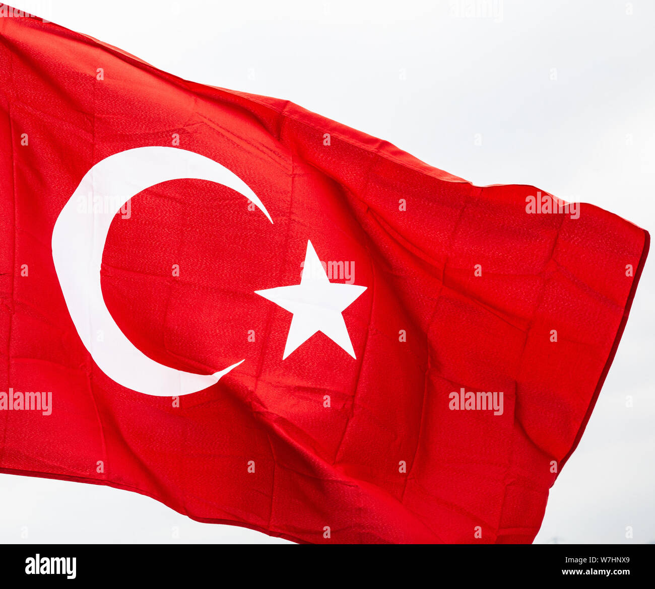 Flag of Turkey waving in the wind with highly detailed fabric texture ...