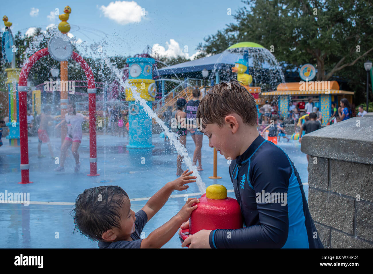 Orlando, Florida. July 30, 2019. Nice kid and little boy playing with ...