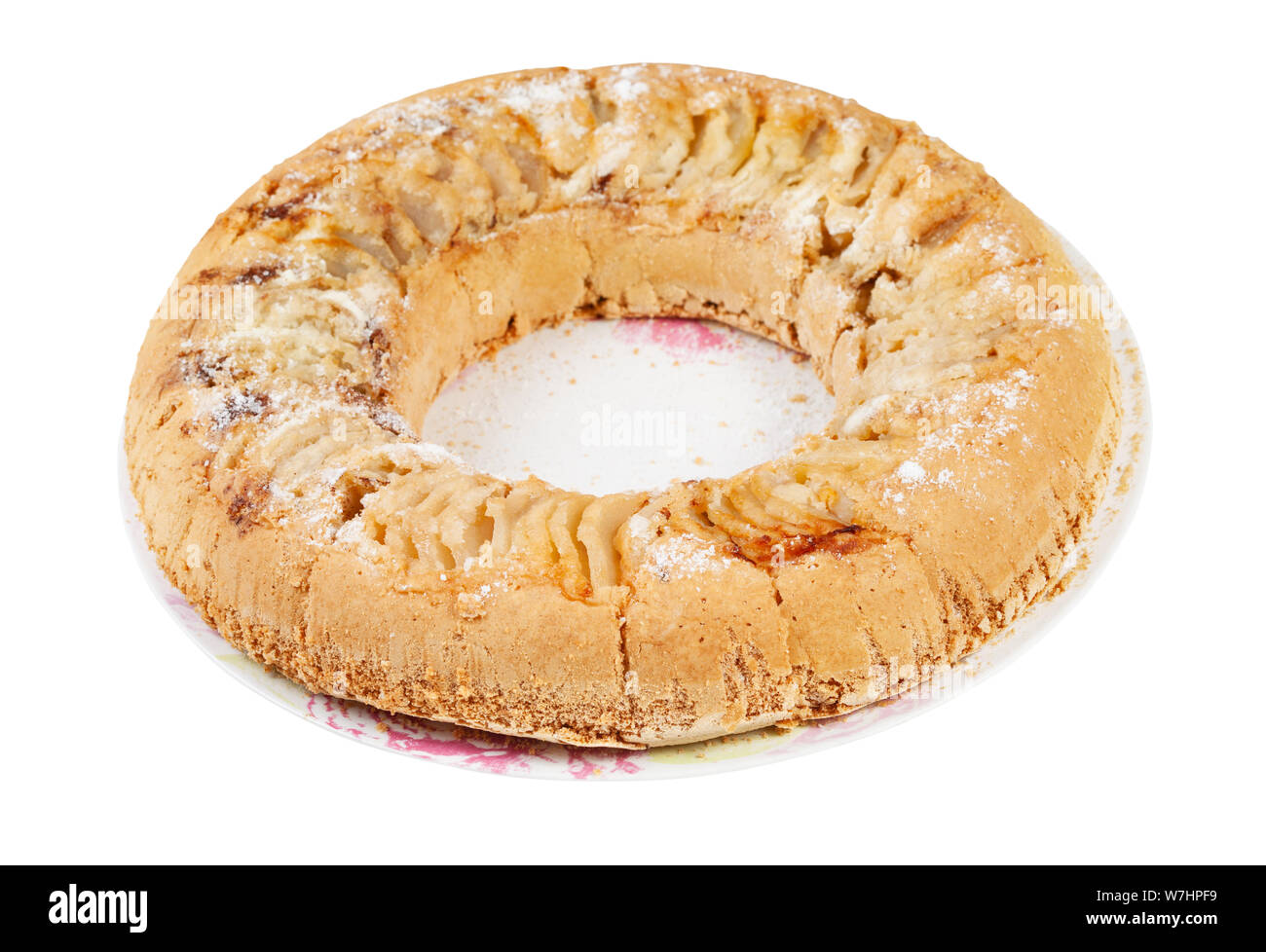 torus-shaped Russian Charlotte apple cake on plate isolated on white ...