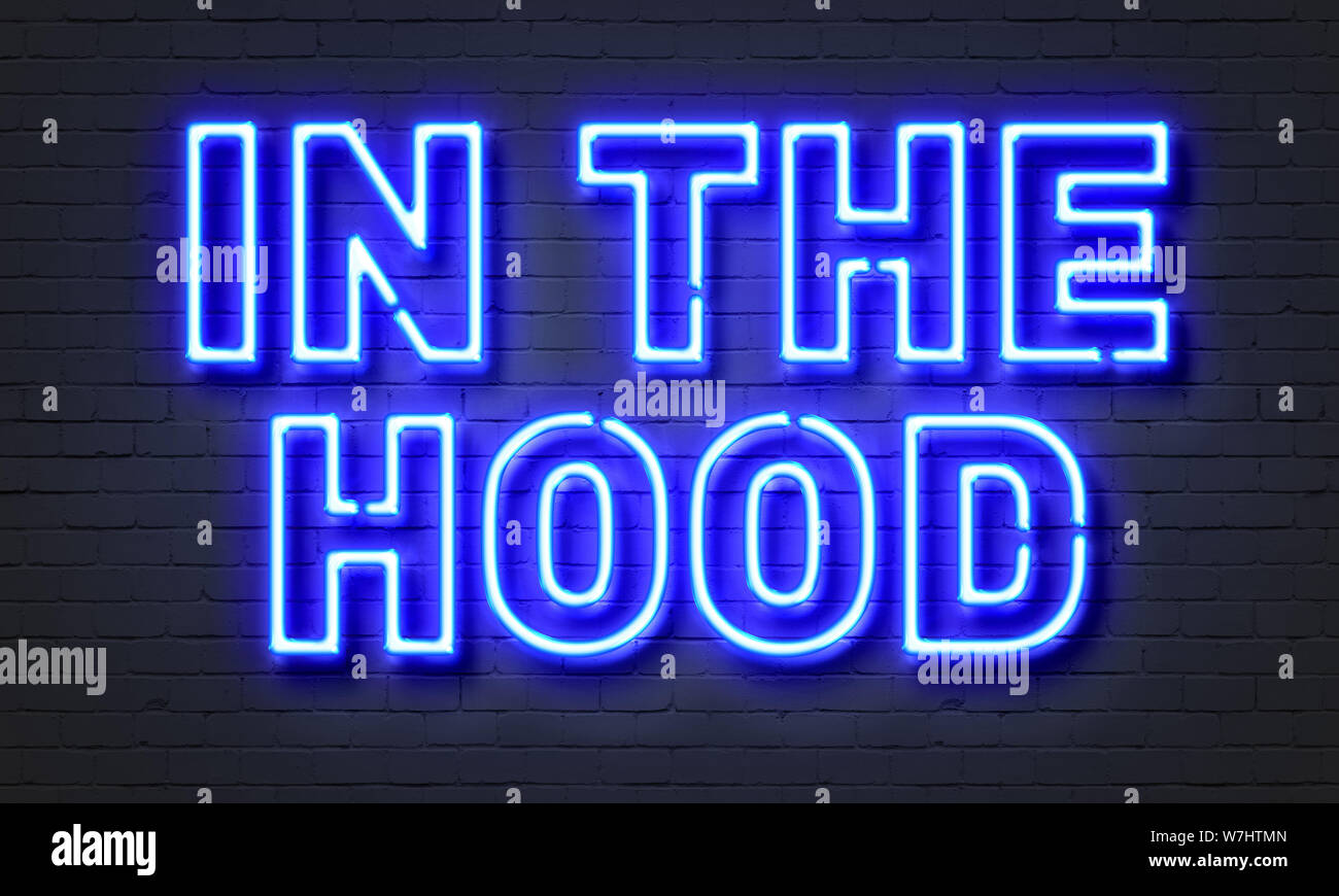In the hood neon sign on brick wall background Stock Photo - Alamy