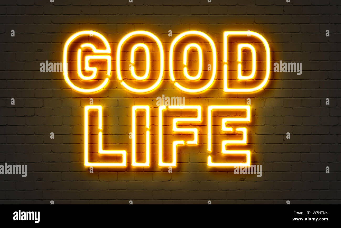 Good life neon sign on brick wall background Stock Photo - Alamy
