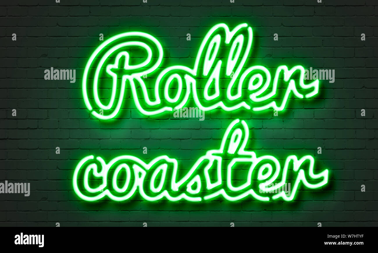 Roller coaster neon sign on brick wall background Stock Photo - Alamy