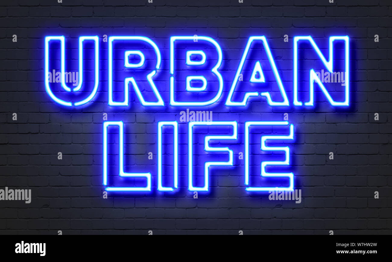 Urban life neon sign on brick wall background Stock Photo - Alamy