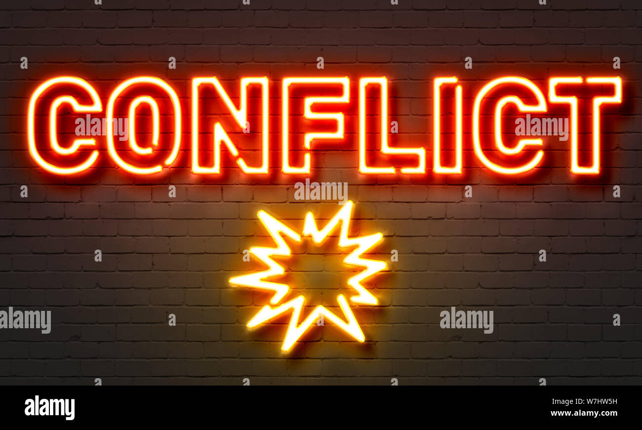 Conflict neon sign on brick wall background Stock Photo - Alamy