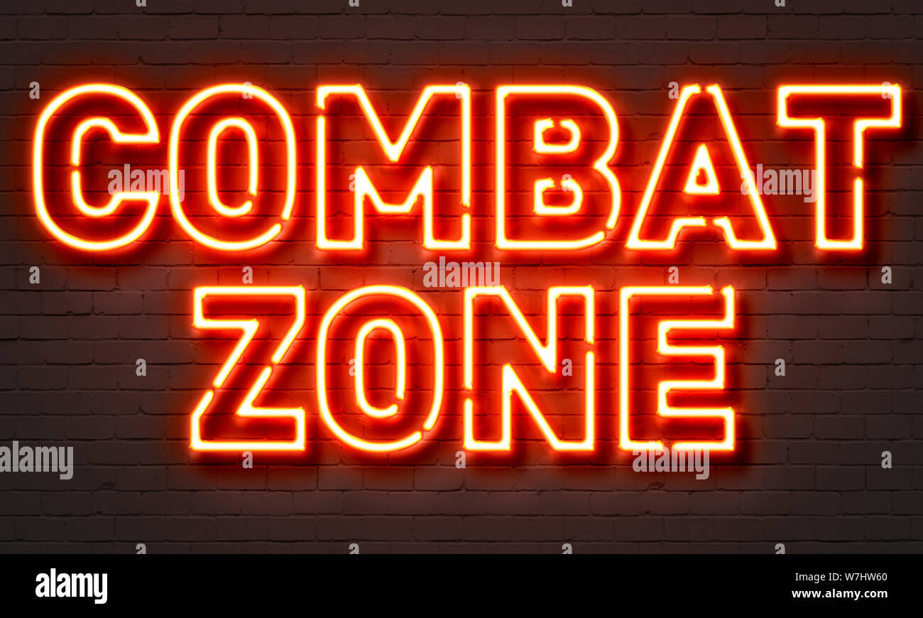 Combat zone neon sign on brick wall background Stock Photo - Alamy