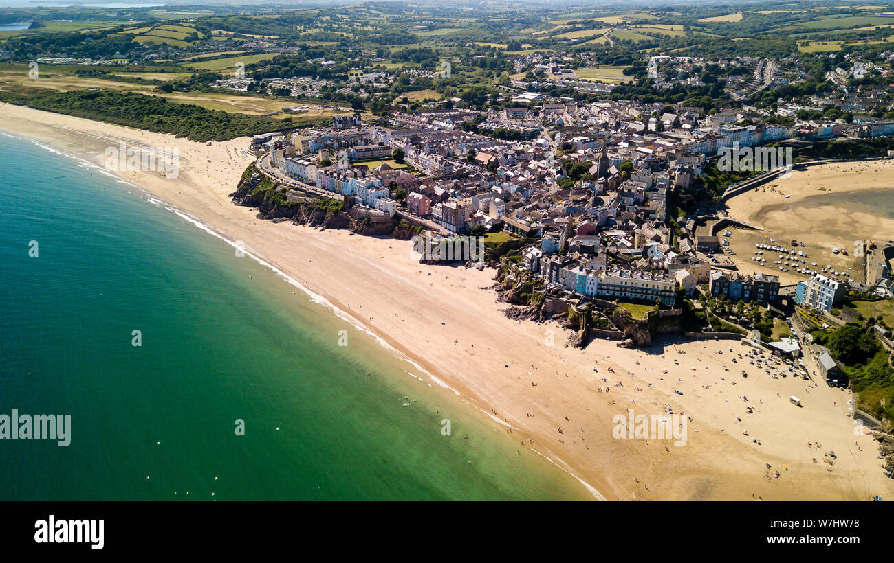Aerial drone view of a picturesque and colorful coastal holiday town ...