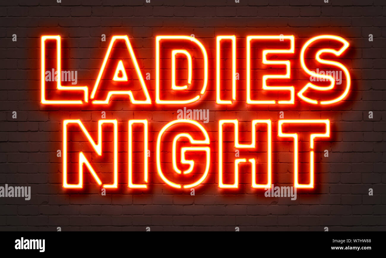 Ladies night neon sign on brick wall background Stock Photo - Alamy