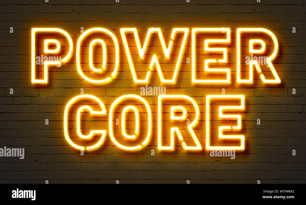 Power core neon sign on brick wall background Stock Photo - Alamy