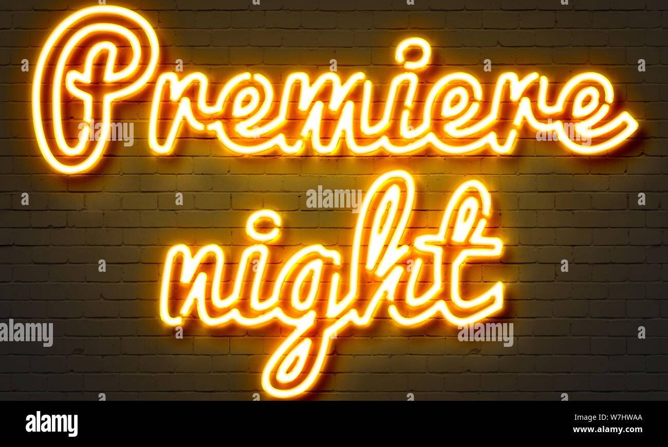 Premiere night neon sign on brick wall background Stock Photo - Alamy