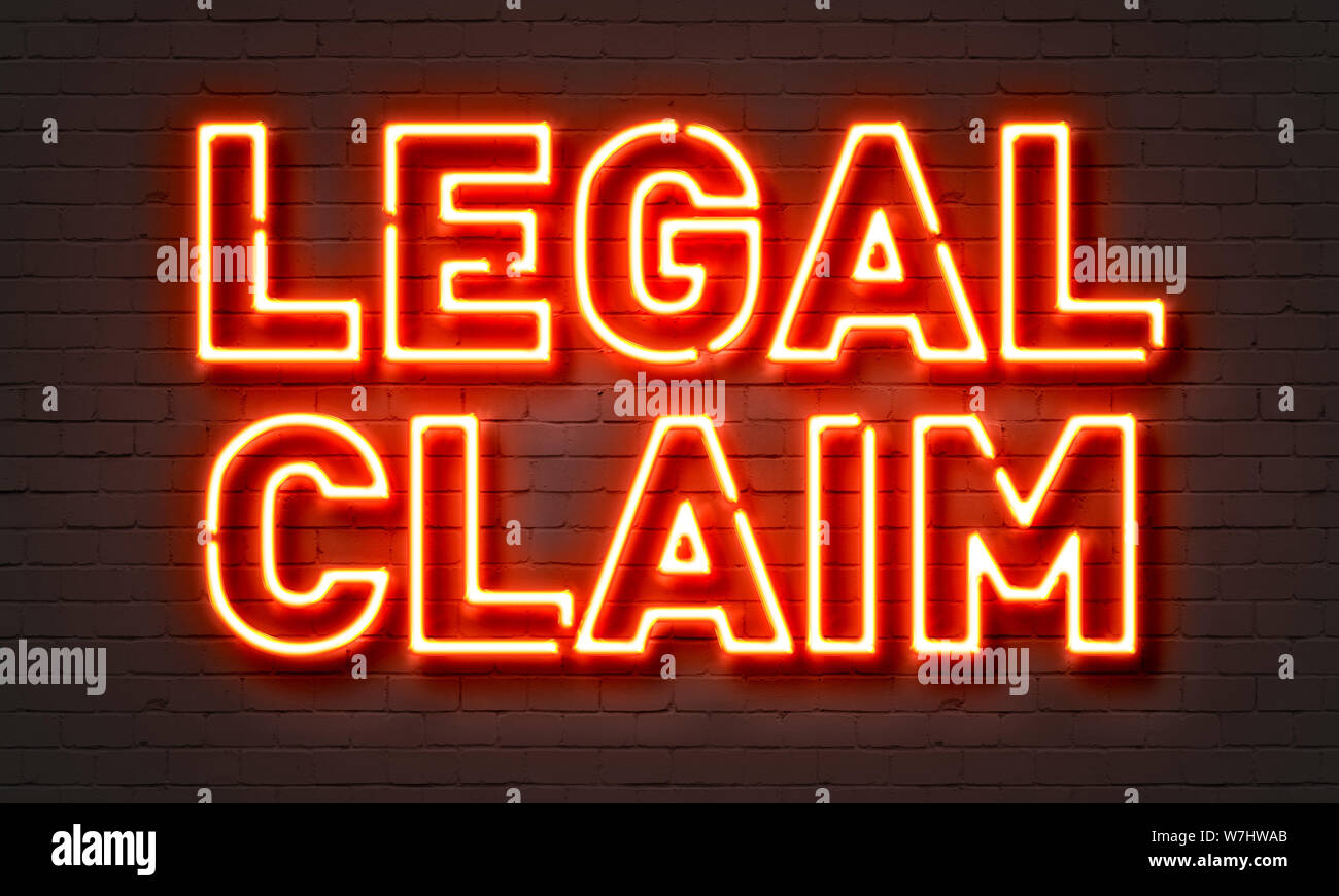 Legal claim neon sign on brick wall background Stock Photo - Alamy