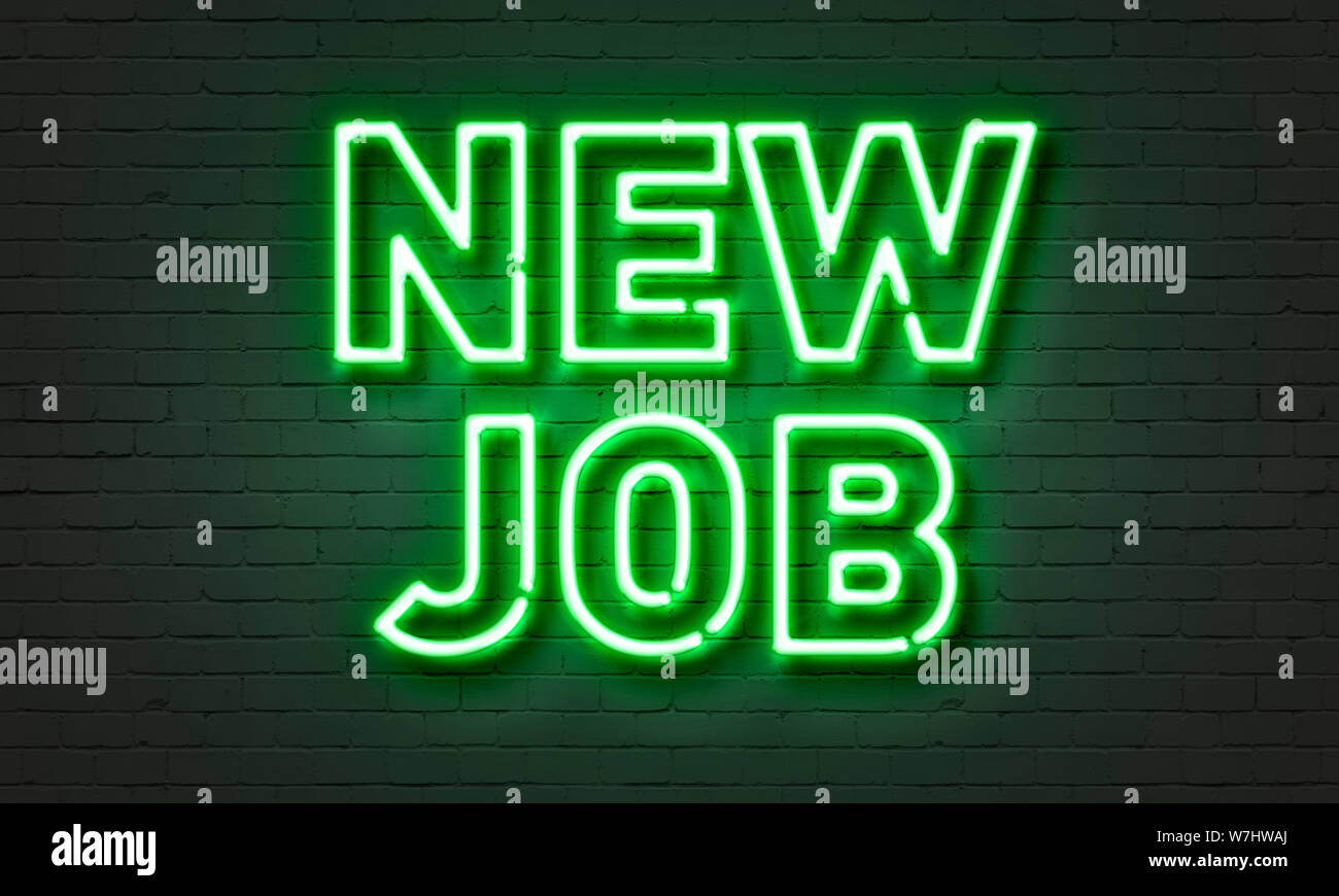 New job neon sign on brick wall background Stock Photo - Alamy