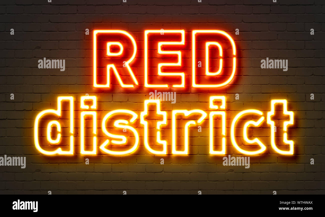 Red district neon sign on brick wall background Stock Photo - Alamy