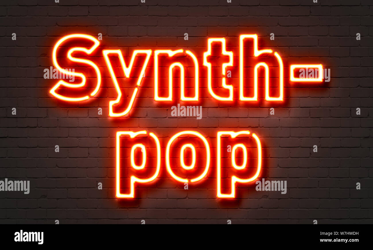 Synthpop neon sign on brick wall background Stock Photo - Alamy