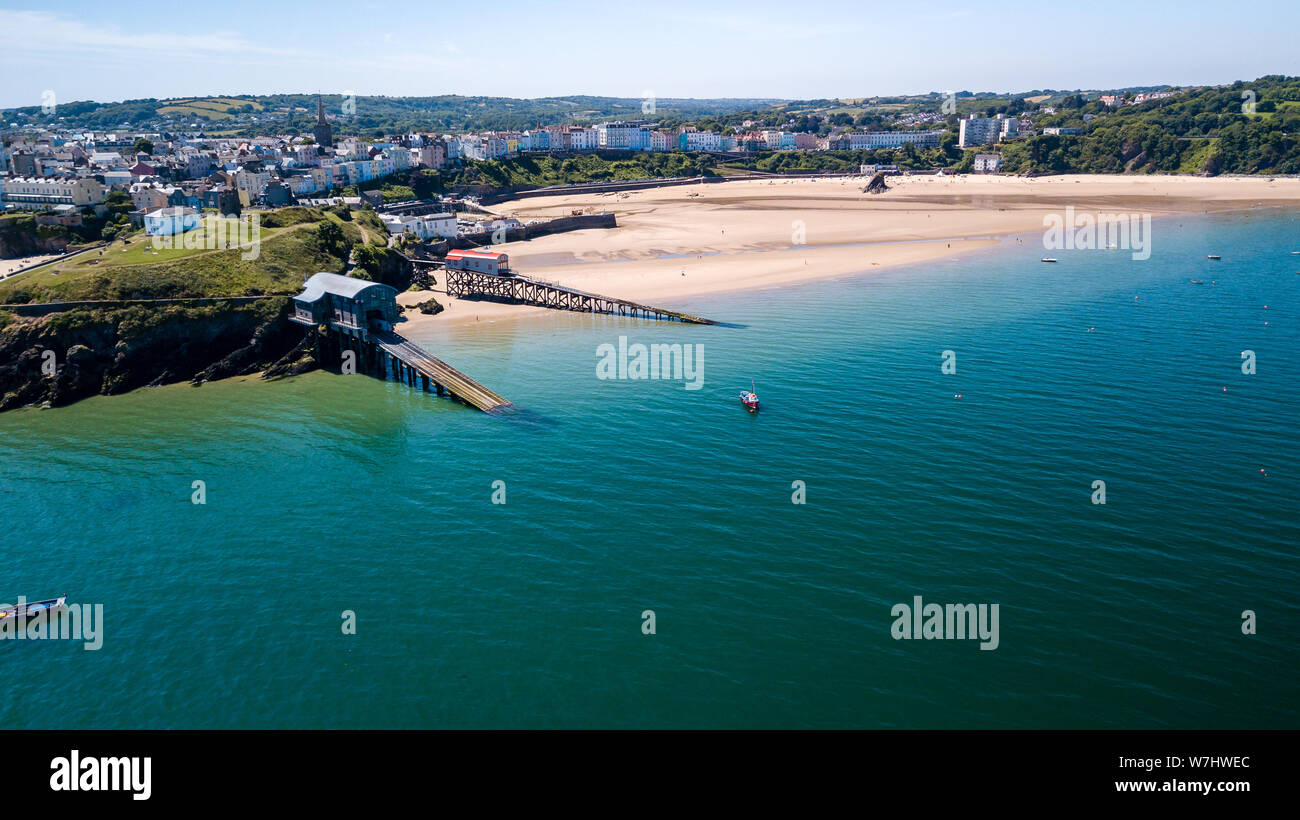 Aerial drone view of huge, beautiful sandy beaches at a colorful ...