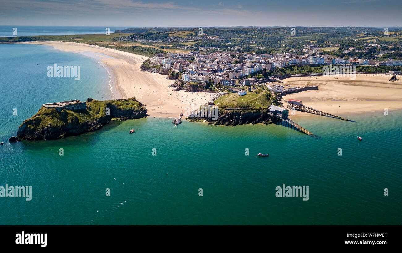 Aerial drone view of huge, beautiful sandy beaches at a colorful ...