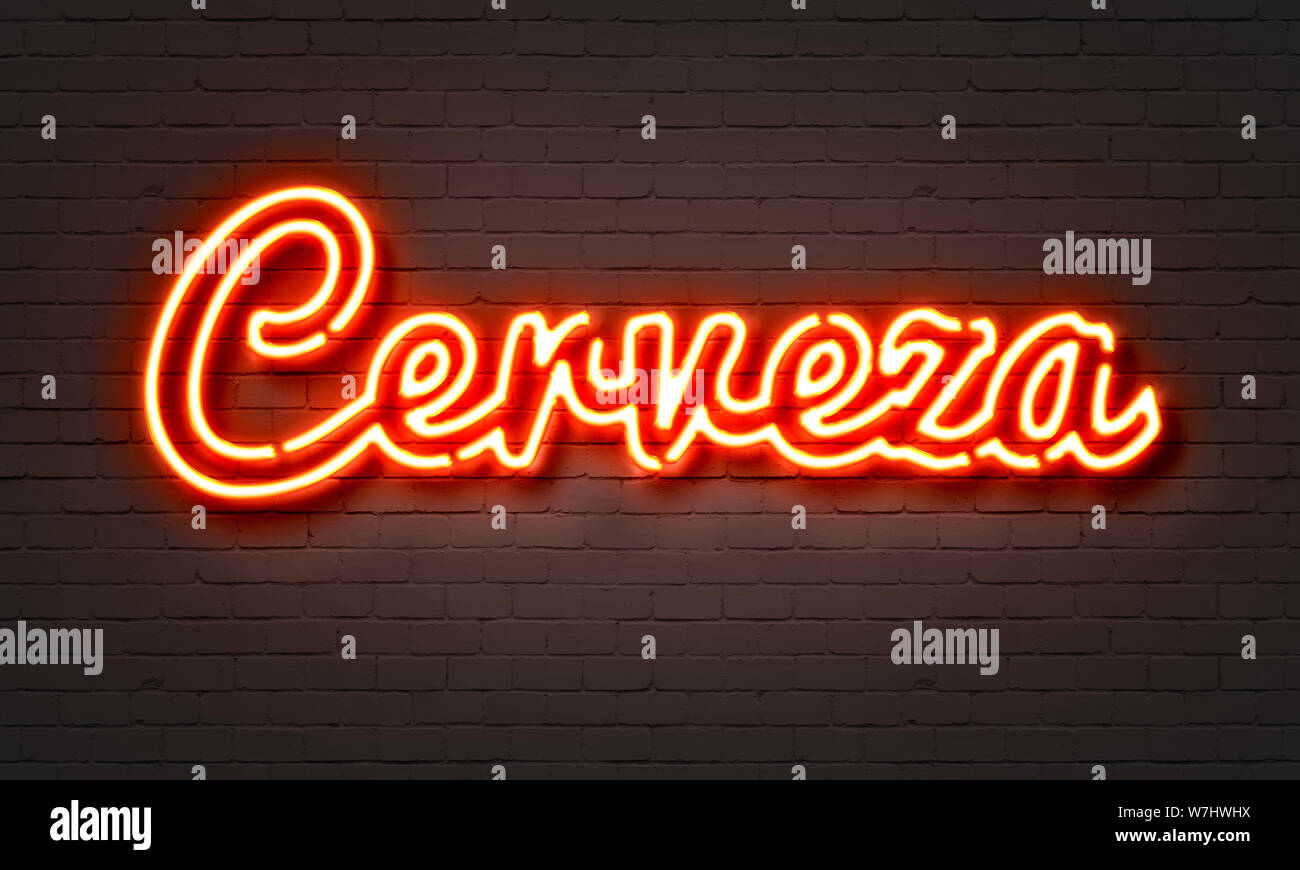 Cerveza neon sign on brick wall background Stock Photo - Alamy
