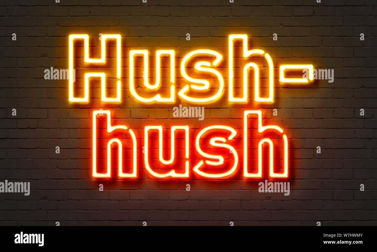 Hush-hish neon sign on brick wall background Stock Photo - Alamy