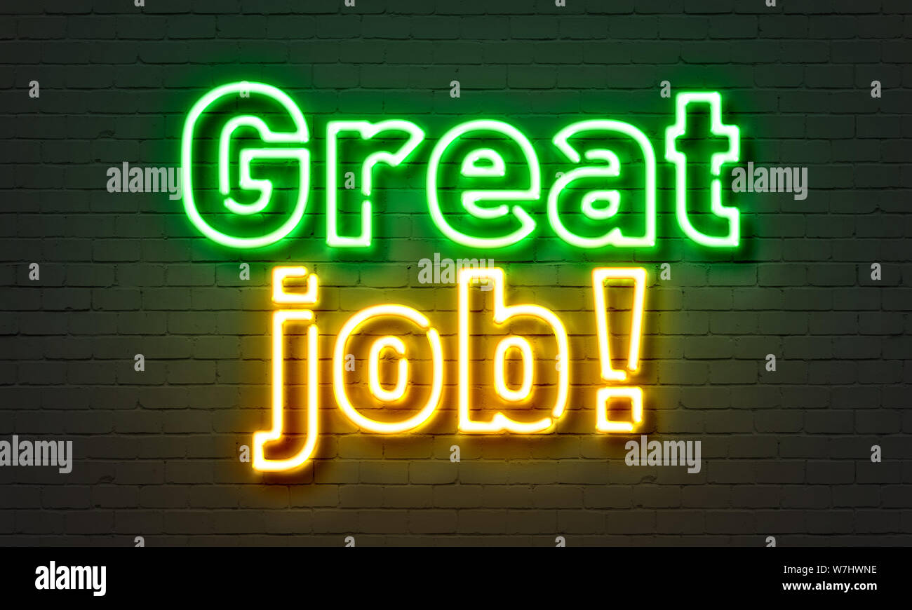 Great job neon sign on brick wall background Stock Photo - Alamy