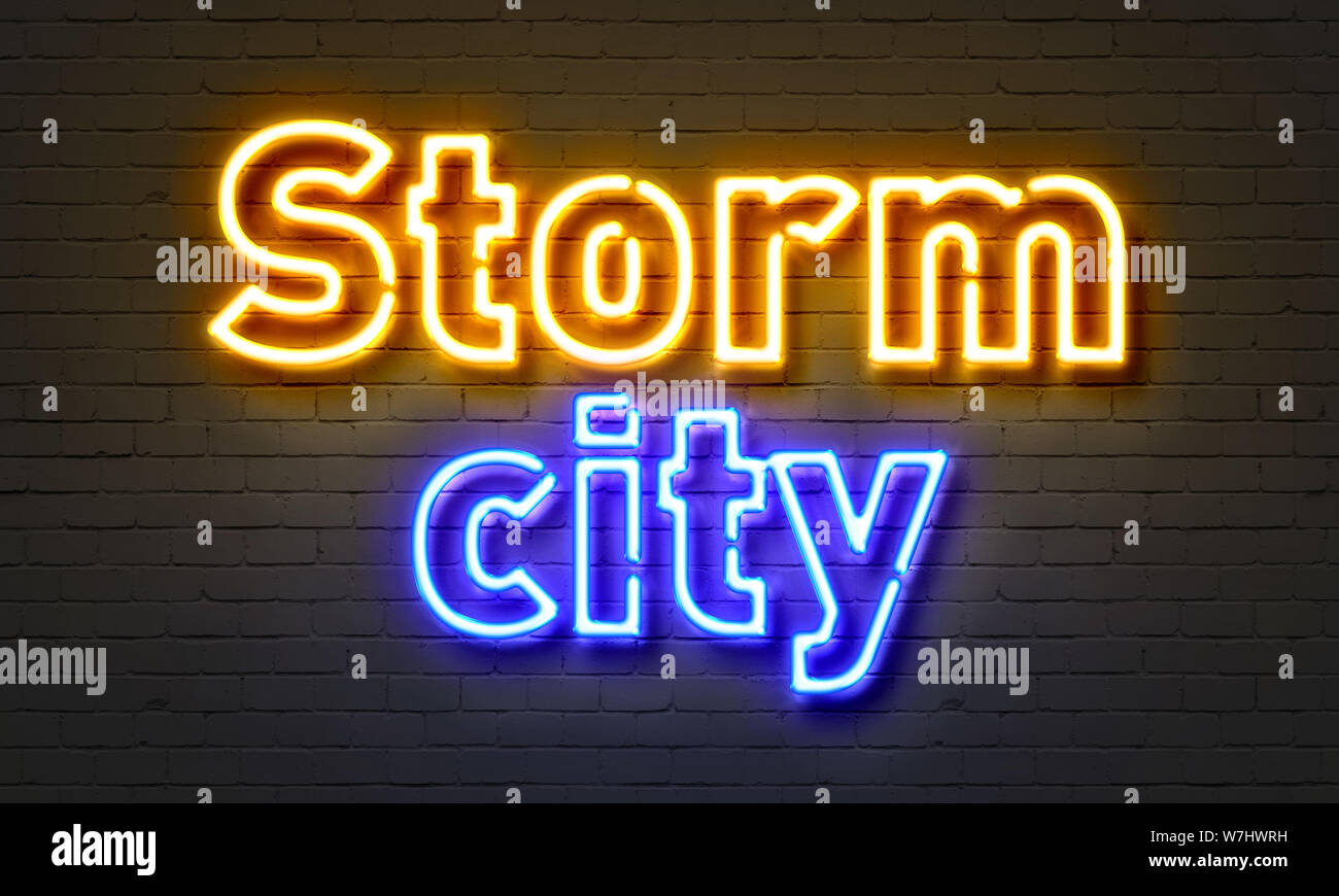 Storm neon sign on brick wall background Stock Photo - Alamy