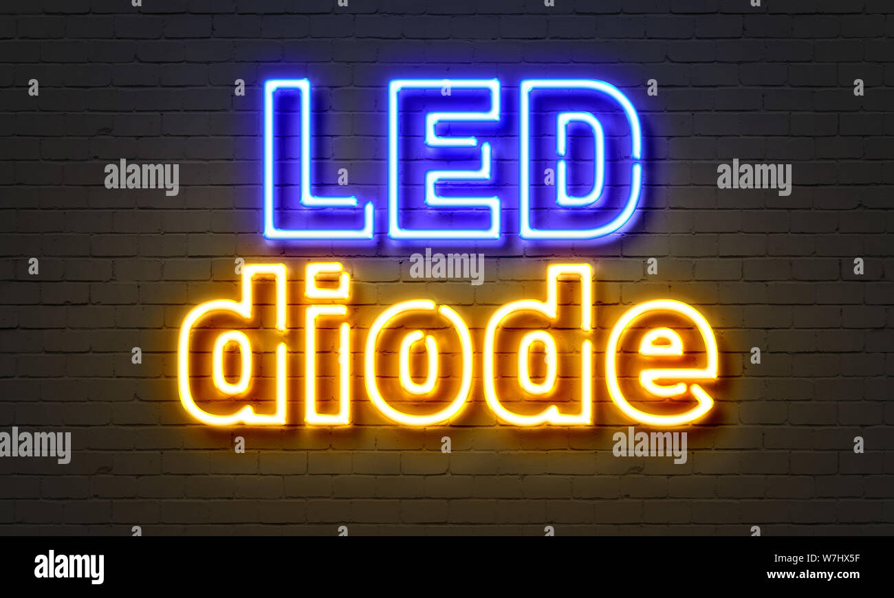 LED diode neon sign on brick wall background Stock Photo - Alamy