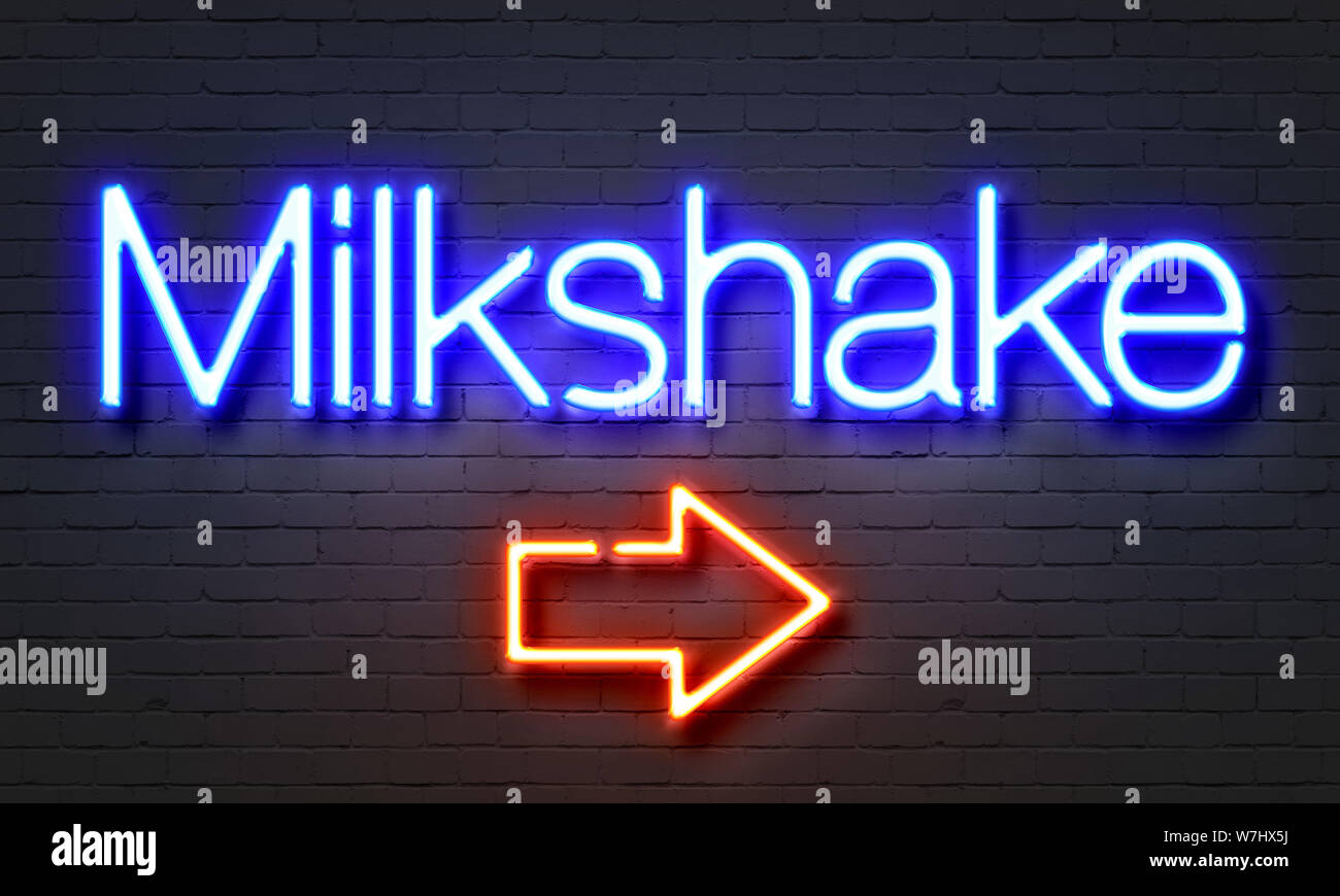 Milkshake neon sign on brick wall background Stock Photo - Alamy