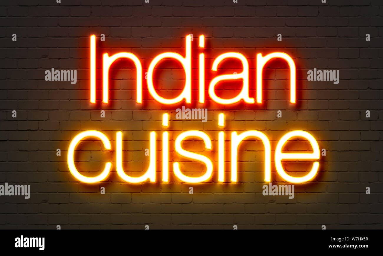Indian cuisine neon sign on brick wall background Stock Photo - Alamy