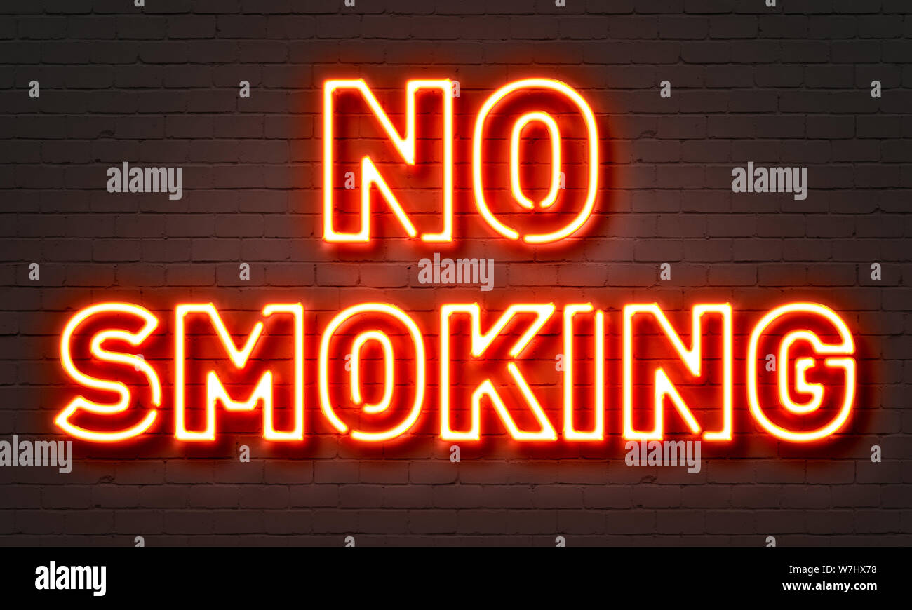 No smoking neon sign on brick wall background Stock Photo - Alamy